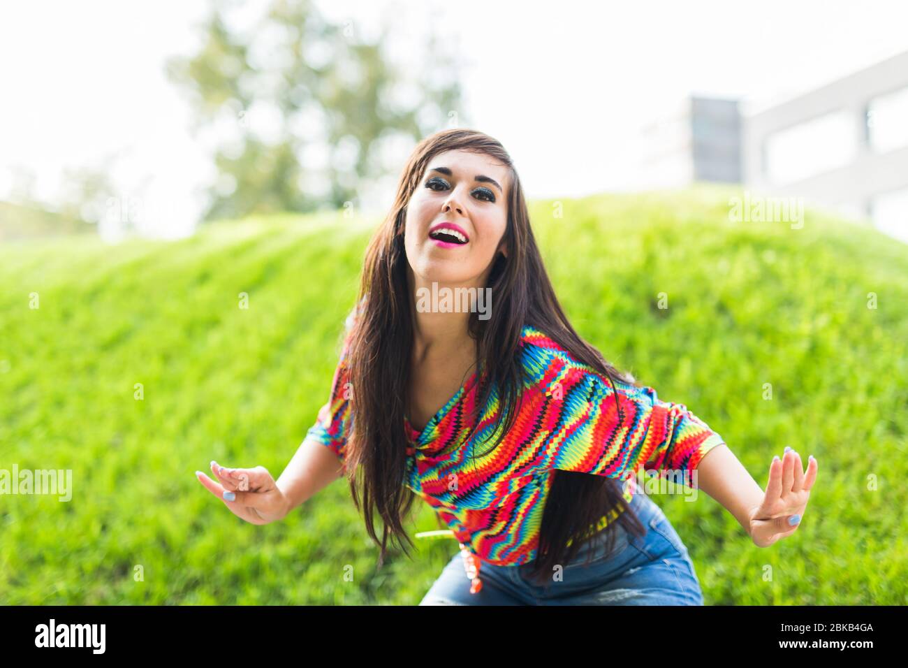Street shaabi dance and urban dancer concept - Cheerful belly dancer ...