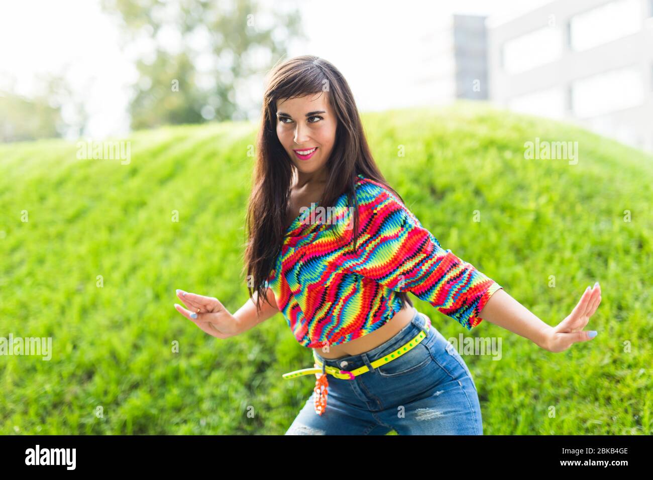 Street shaabi dance and urban dancer concept - Cheerful belly dancer ...