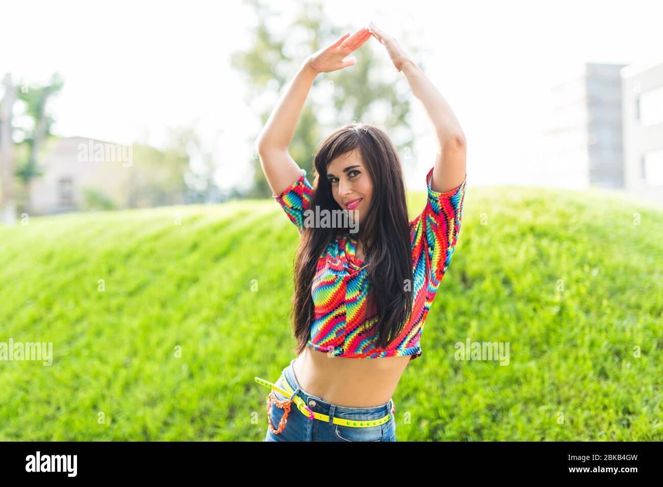Street shaabi dance and urban dancer concept - Cheerful belly dancer ...
