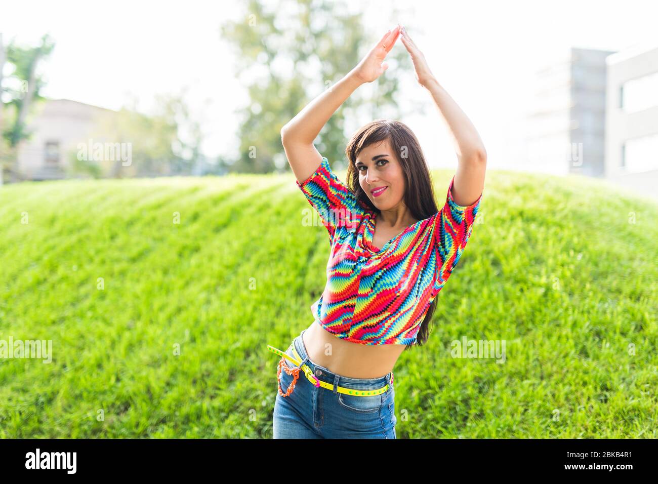 Street shaabi dance and urban dancer concept - Cheerful belly dancer ...