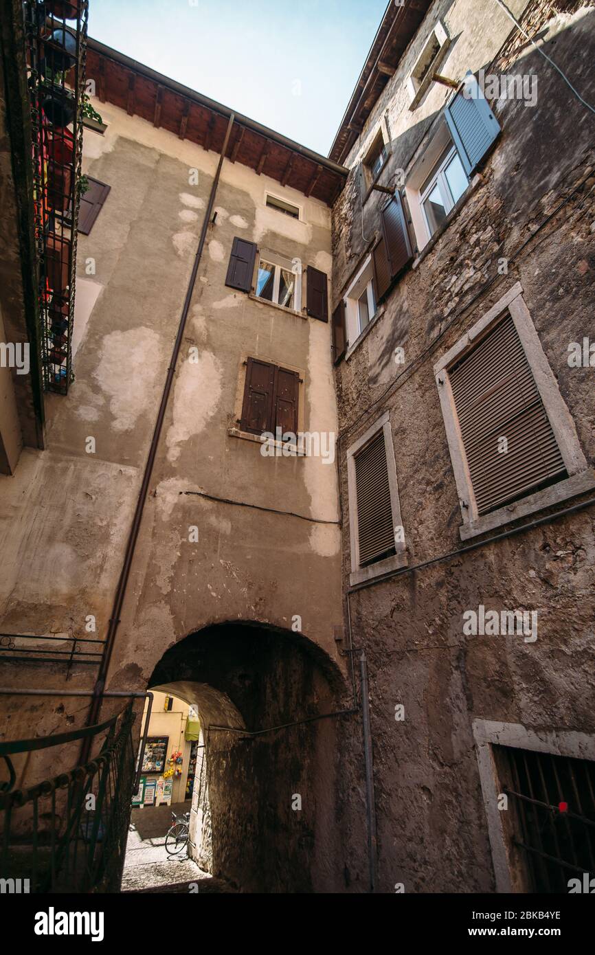old italian house bottom view on blue sky background Stock Photo - Alamy