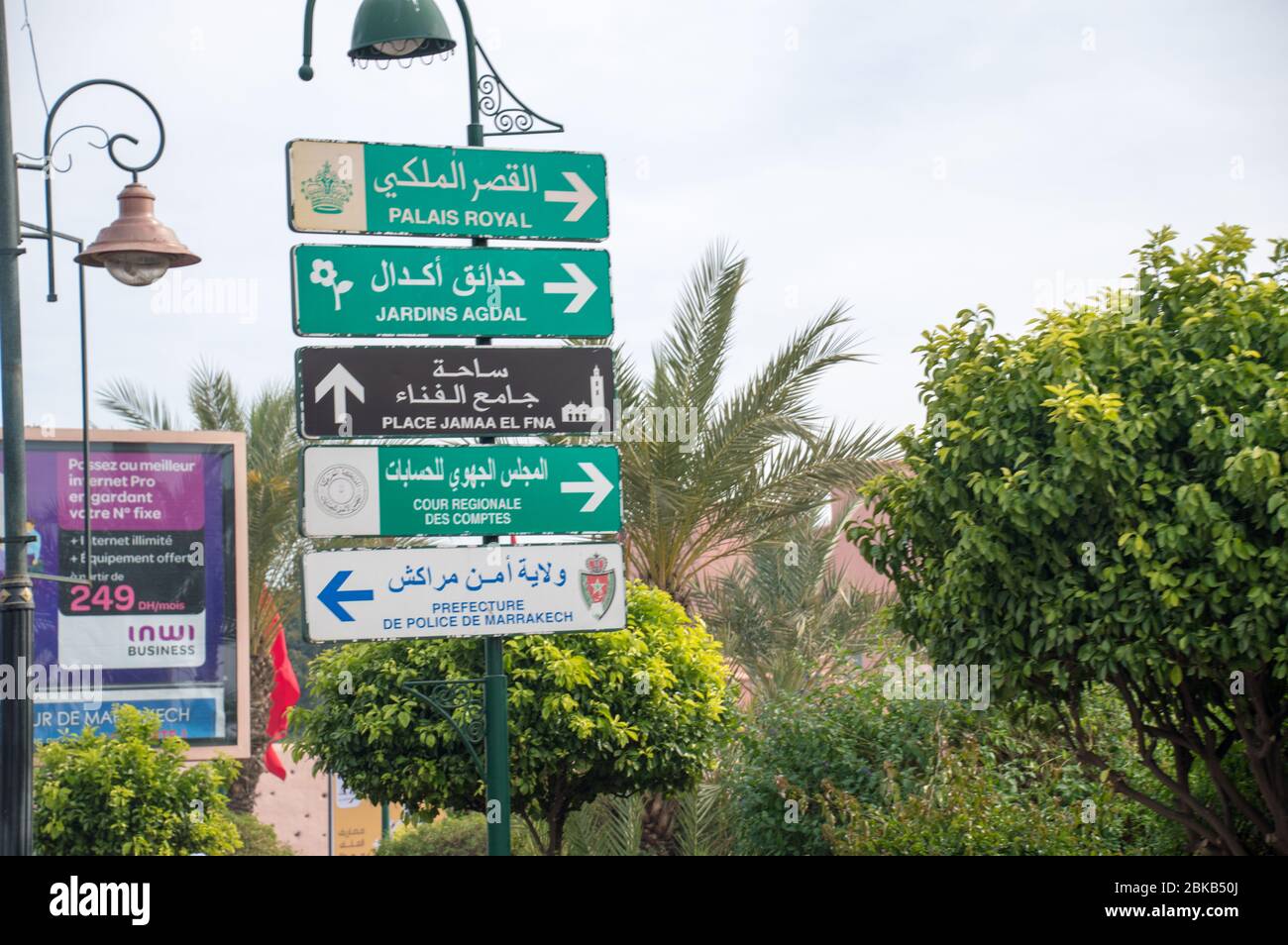Direction sign boards in the city of Marrakech with Arabic and English ...