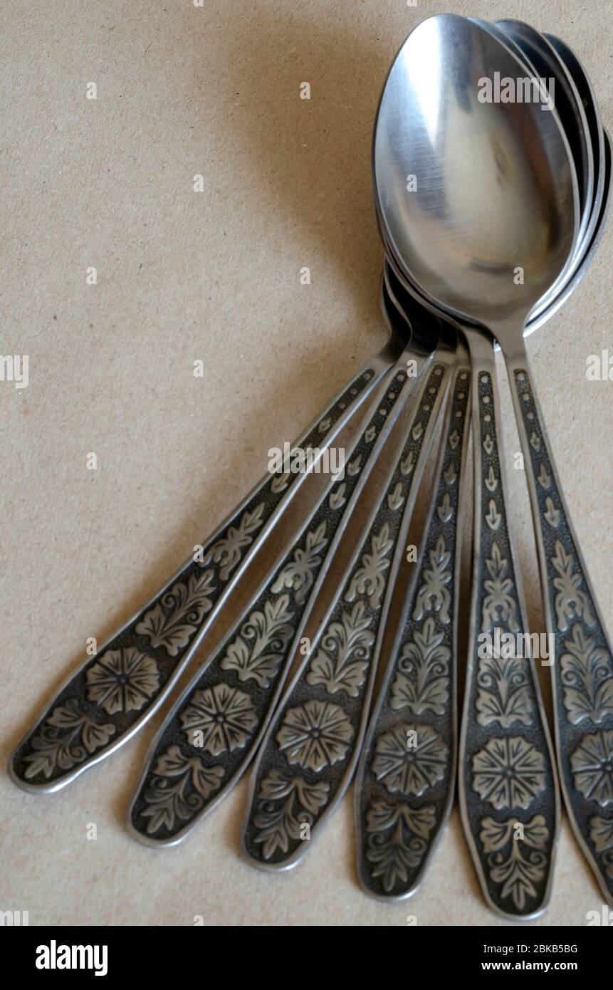 A few tablespoons on the table. Metal spoons dry after washing ...