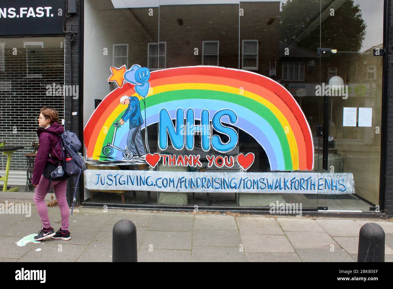 a shop window display thanks the NHS and promotes captain tom just ...