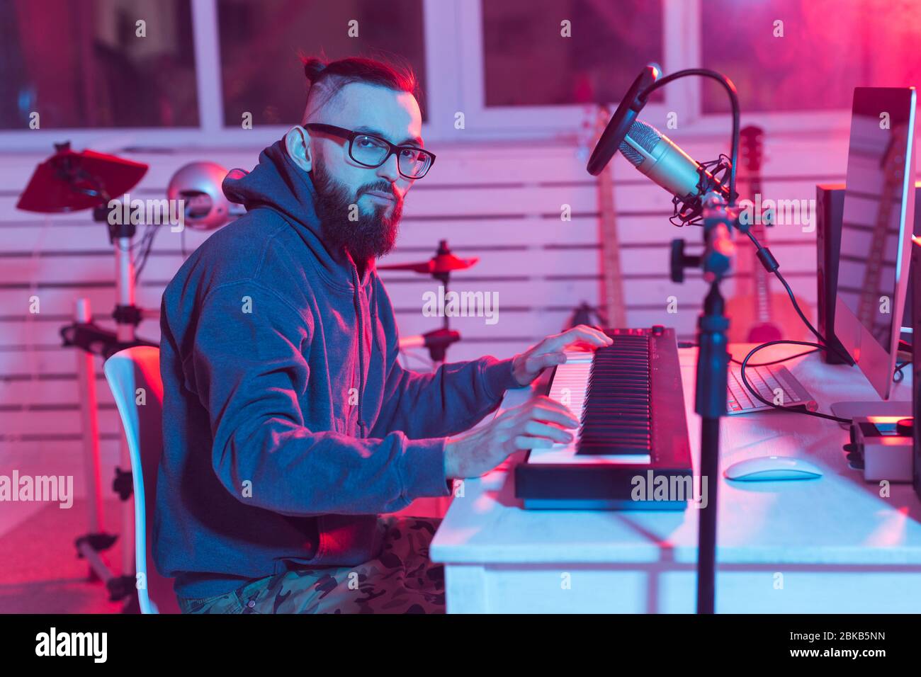 Male sound producer working in recording studio Stock Photo - Alamy