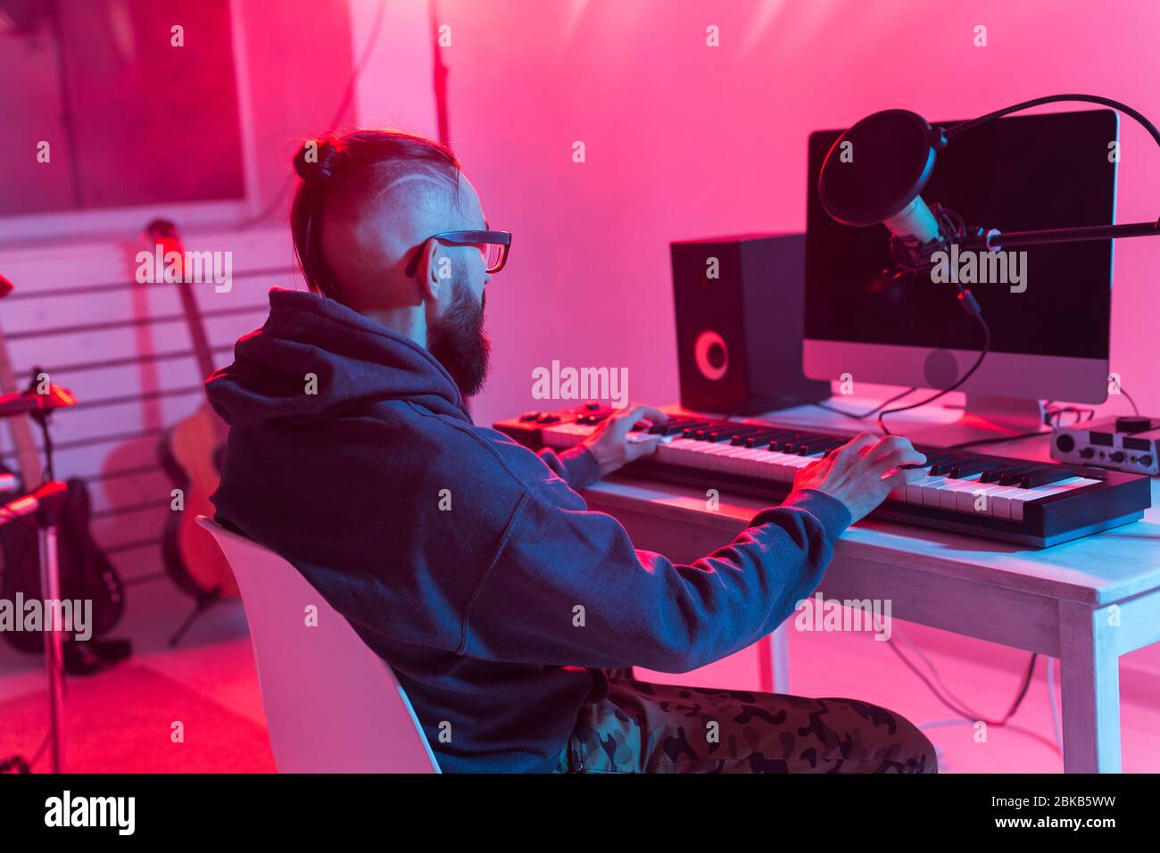 Male sound producer working in recording studio Stock Photo - Alamy