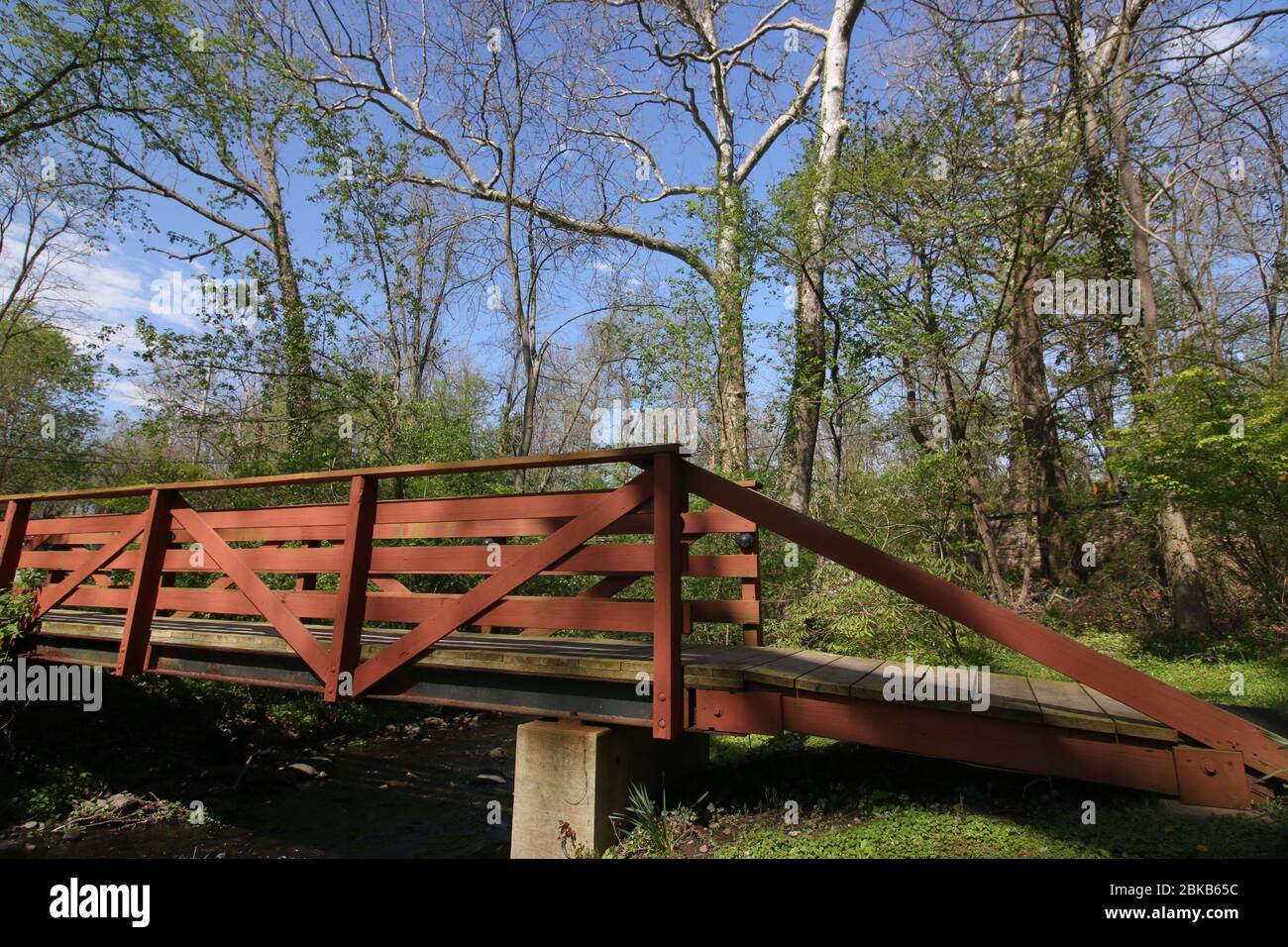 The bridge crosses over the stream Stock Photo - Alamy