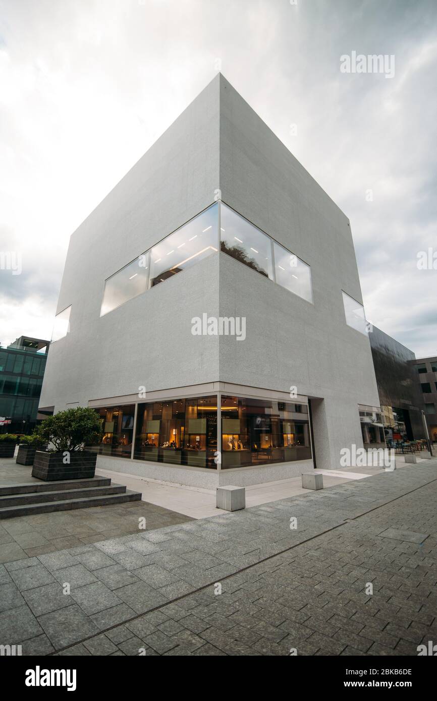 White square house on a background of gray sky Stock Photo - Alamy