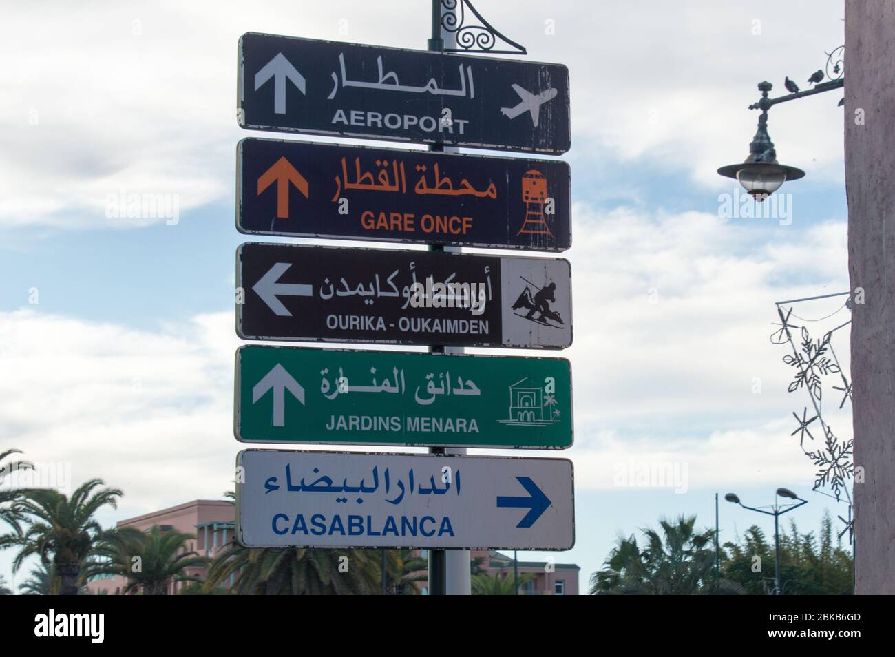 Direction sign boards in the city of Marrakech with Arabic and English ...
