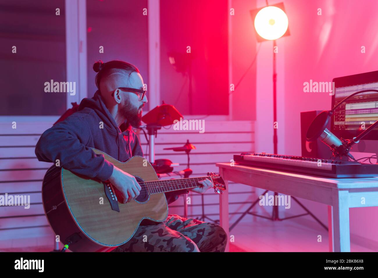 Male sound producer working in recording studio Stock Photo - Alamy