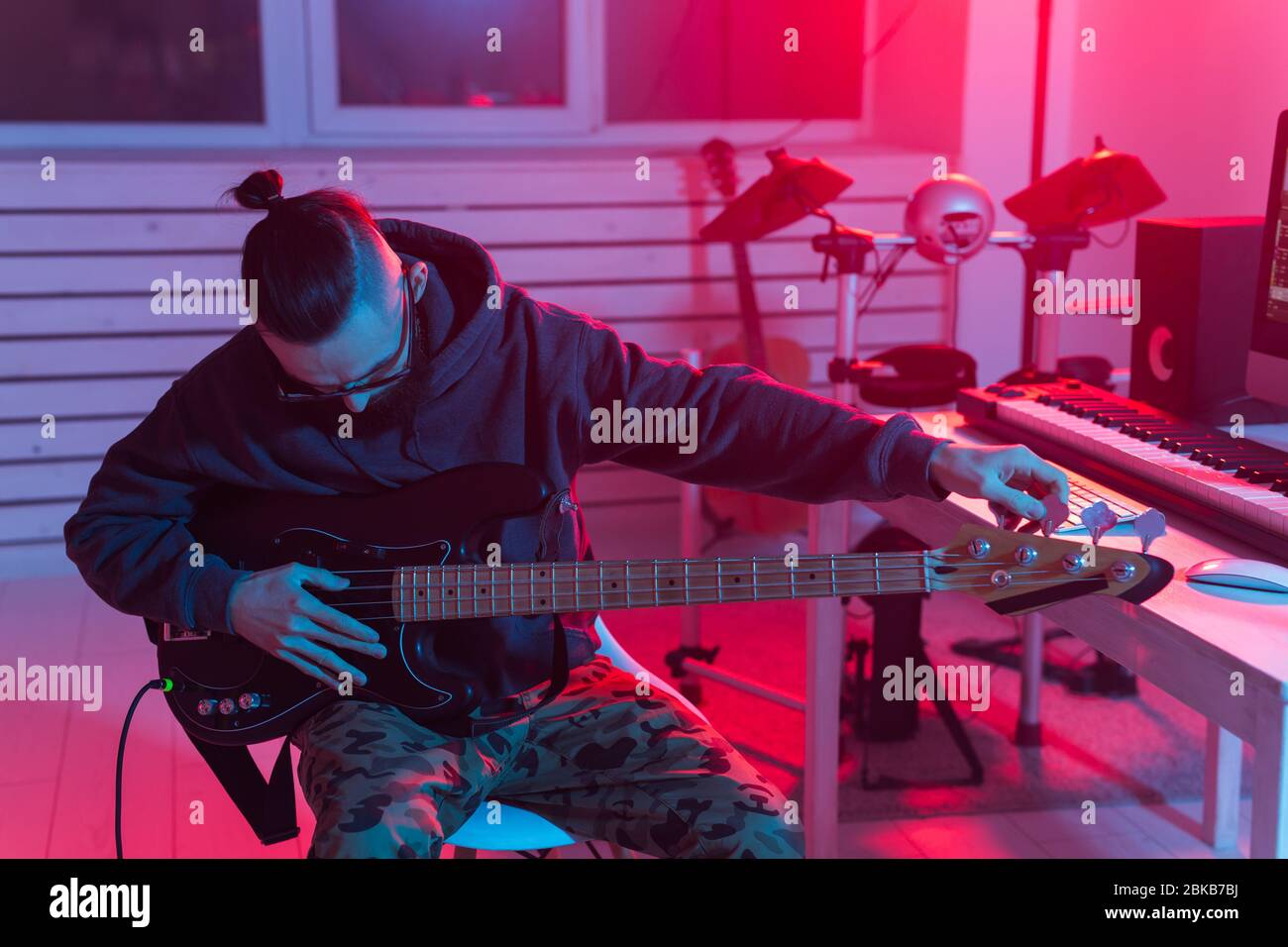 Create music and a recording studio concept - Bearded man guitarist ...