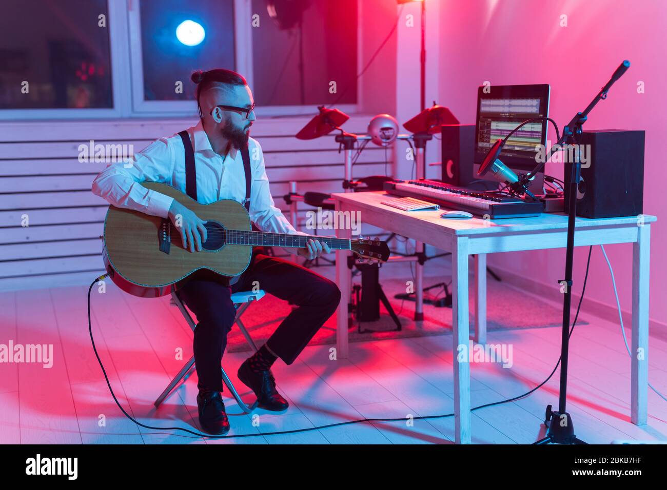 Create music and a recording studio concept - Bearded man guitarist ...