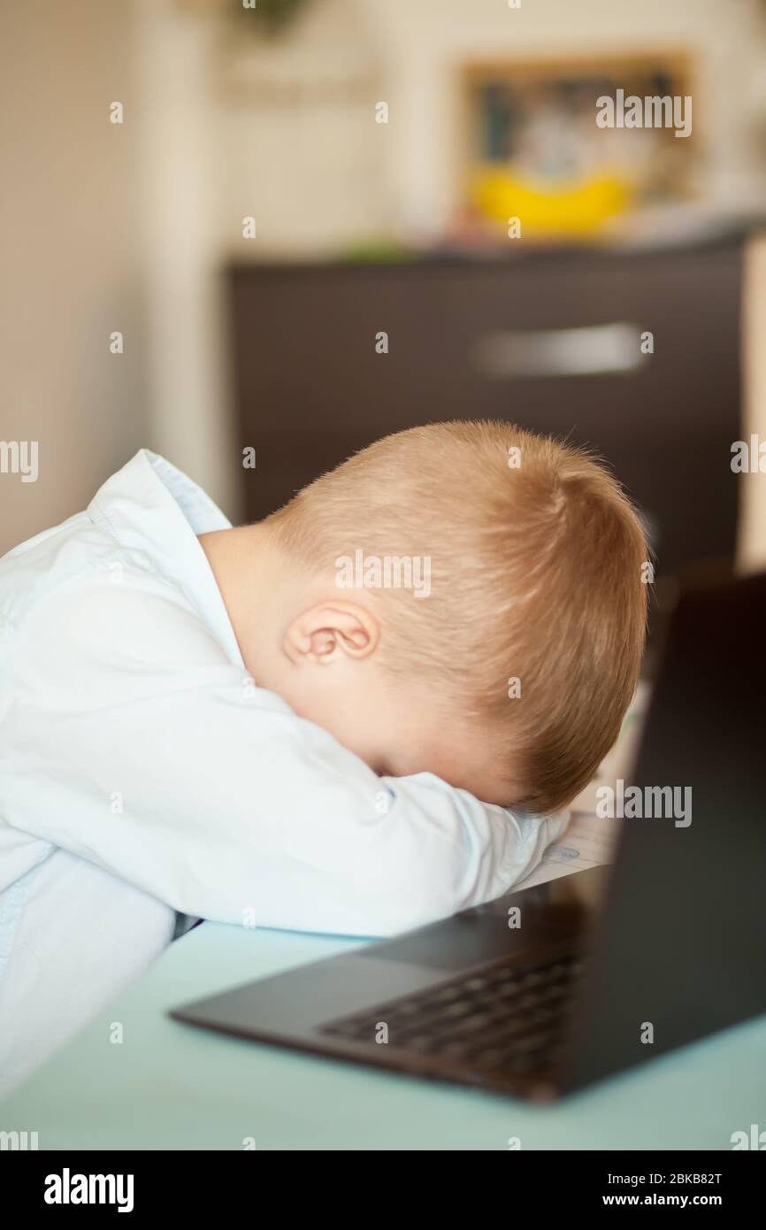 Child asleep at desk hi-res stock photography and images - Alamy