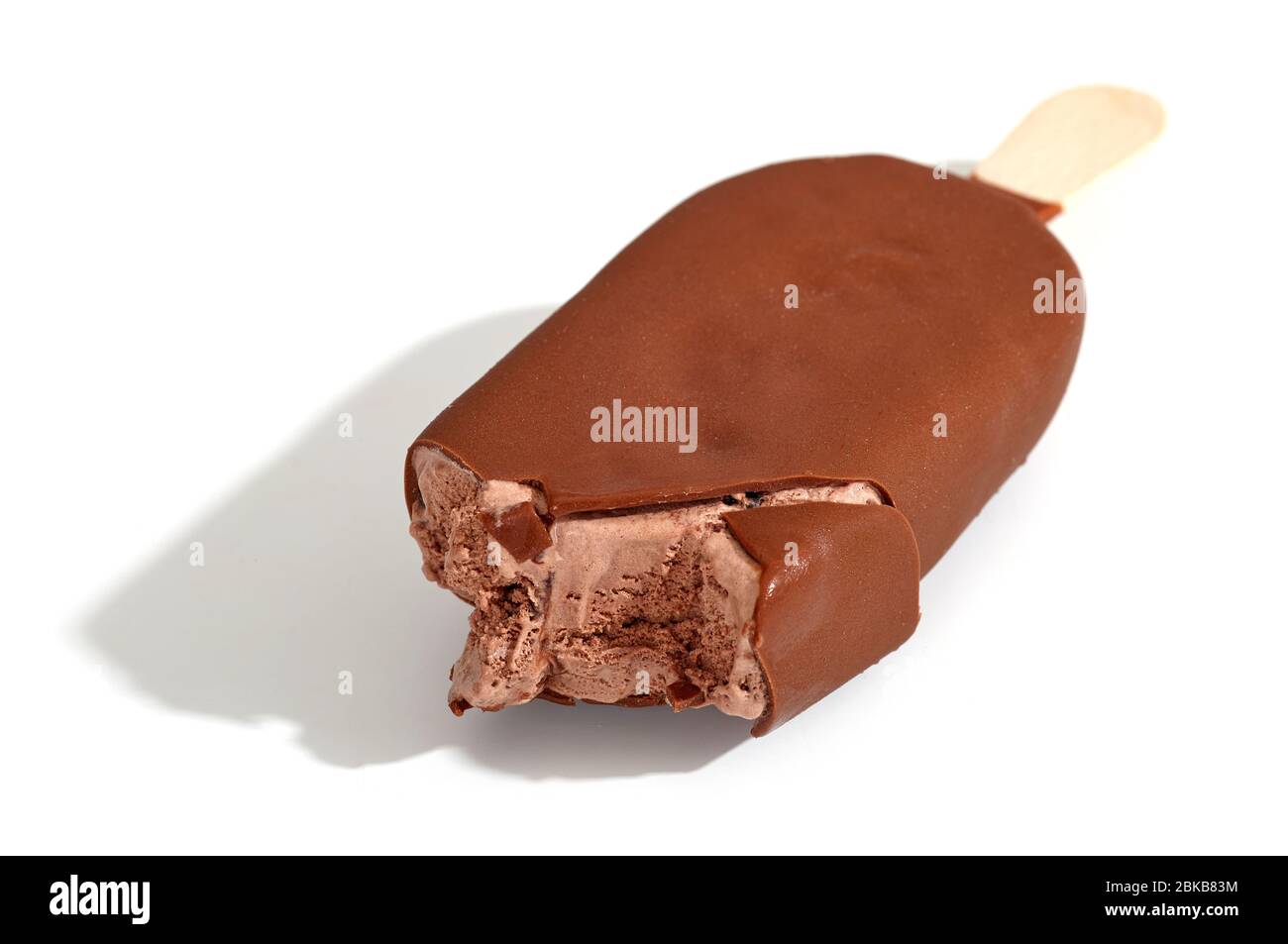 bitten ice cream covered with chocolate isolated on white background ...