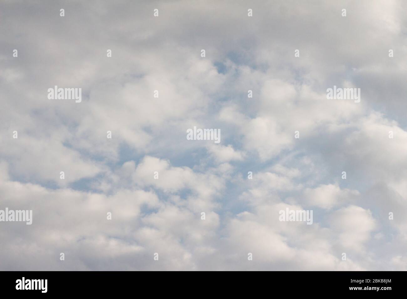 summer sky with dark colors and very gray clouds and rain-laden ...