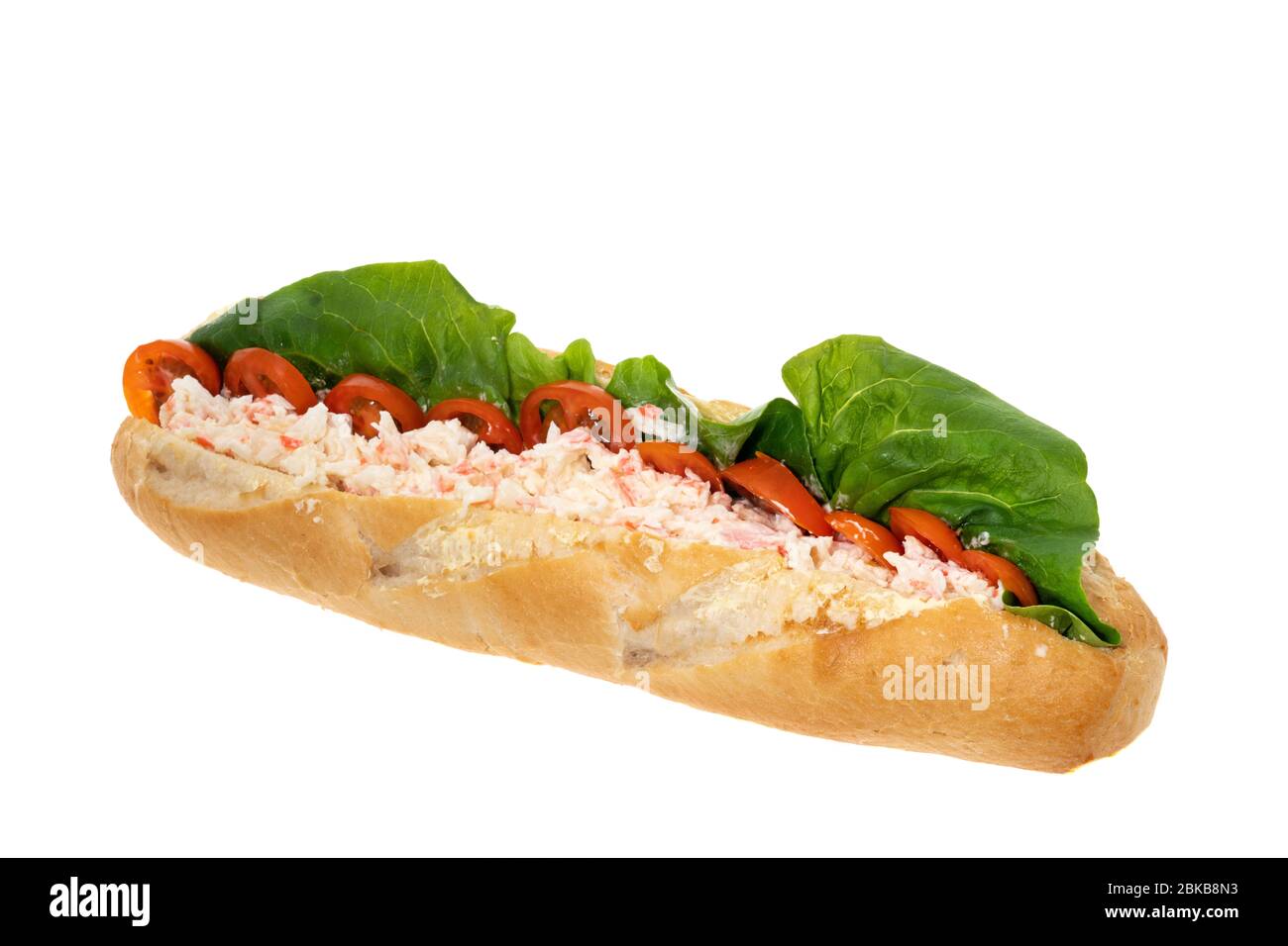 Crab salad sub sandwich - white background Stock Photo - Alamy
