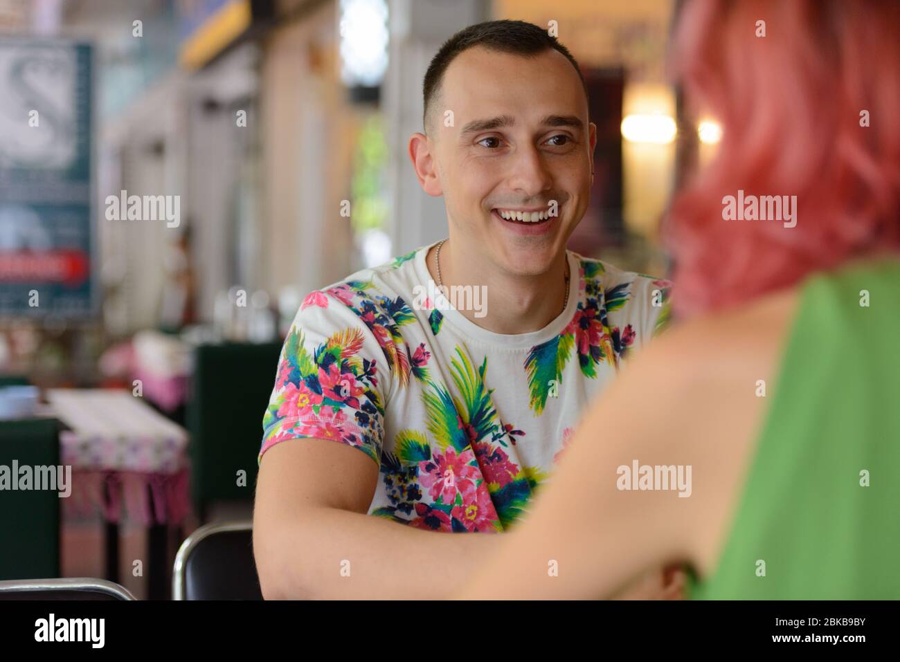Happy handsome man having date with woman at the restaurant Stock Photo ...