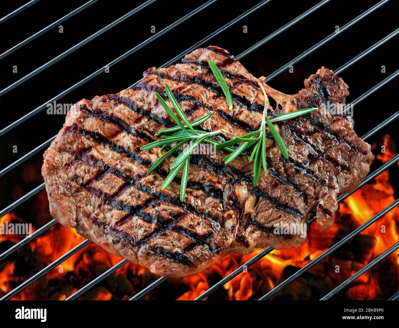 beef steak meat on grill with red coal Stock Photo - Alamy