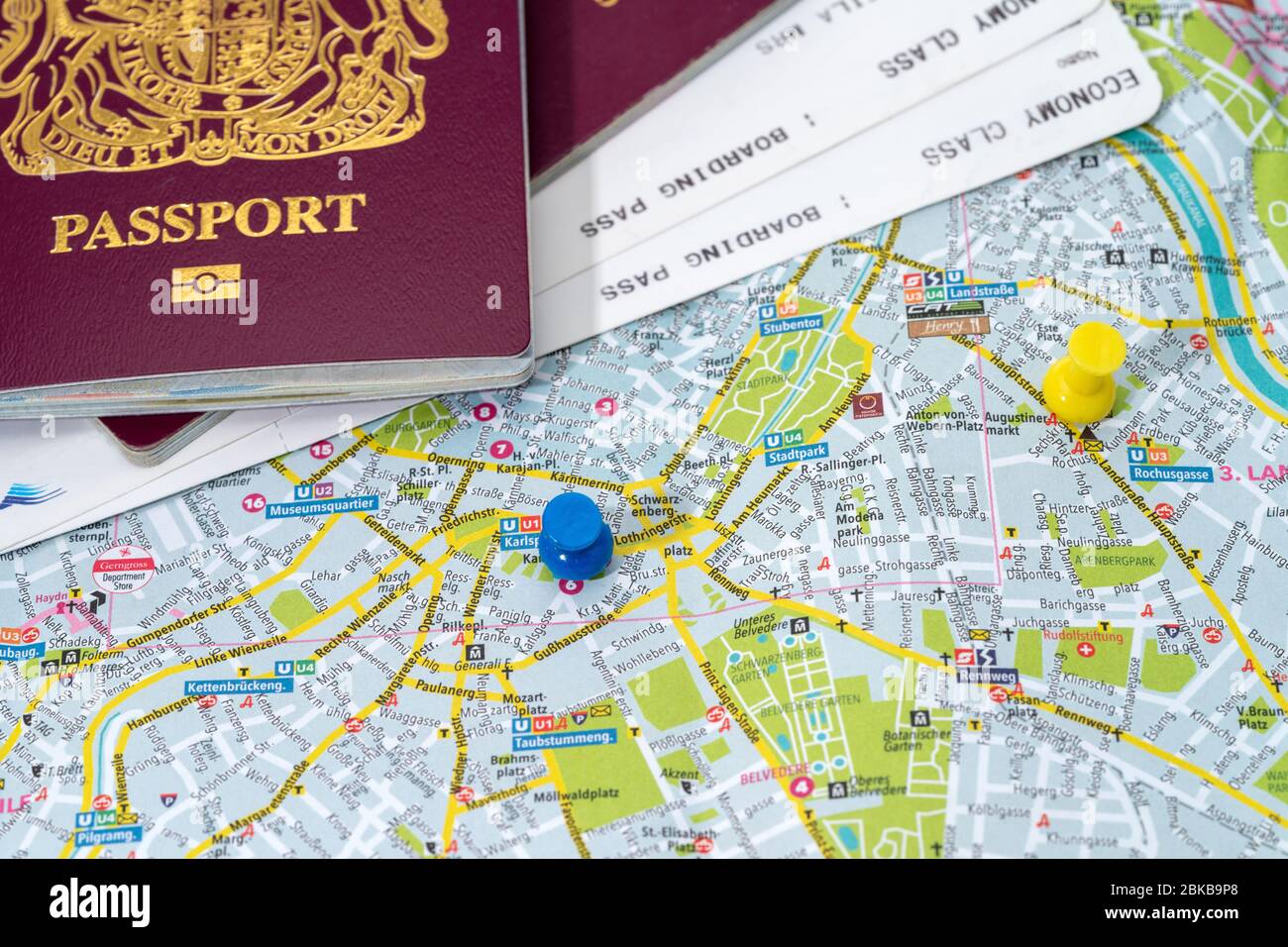 Maps with pins and passports, planning the holidays Stock Photo - Alamy