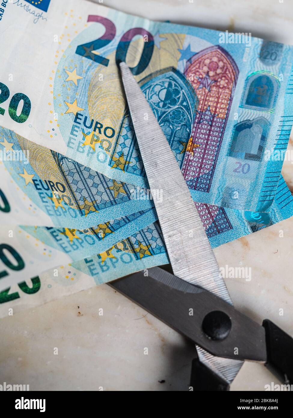 Cutting emission and debt avoiding loss of value. Euro money currency ...