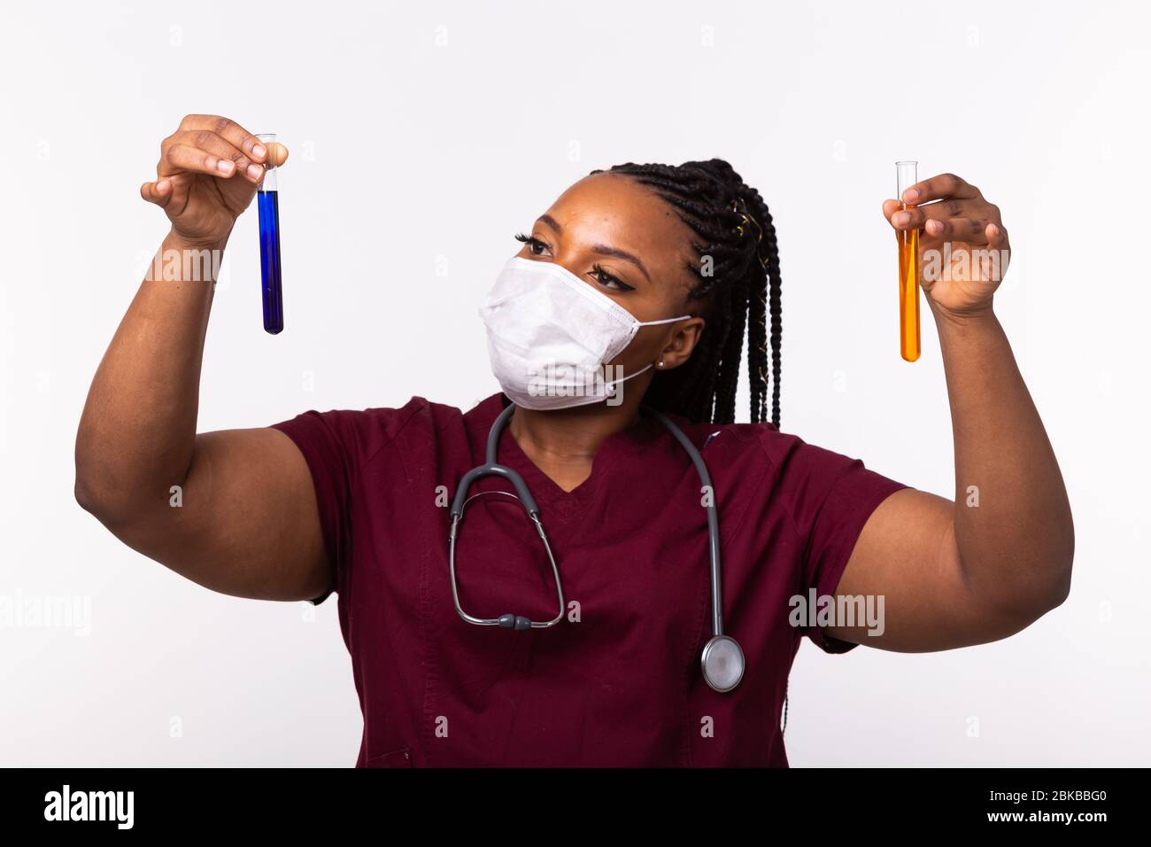 Glass tubes with fluids in nurse hand during medical test. Vaccine ...