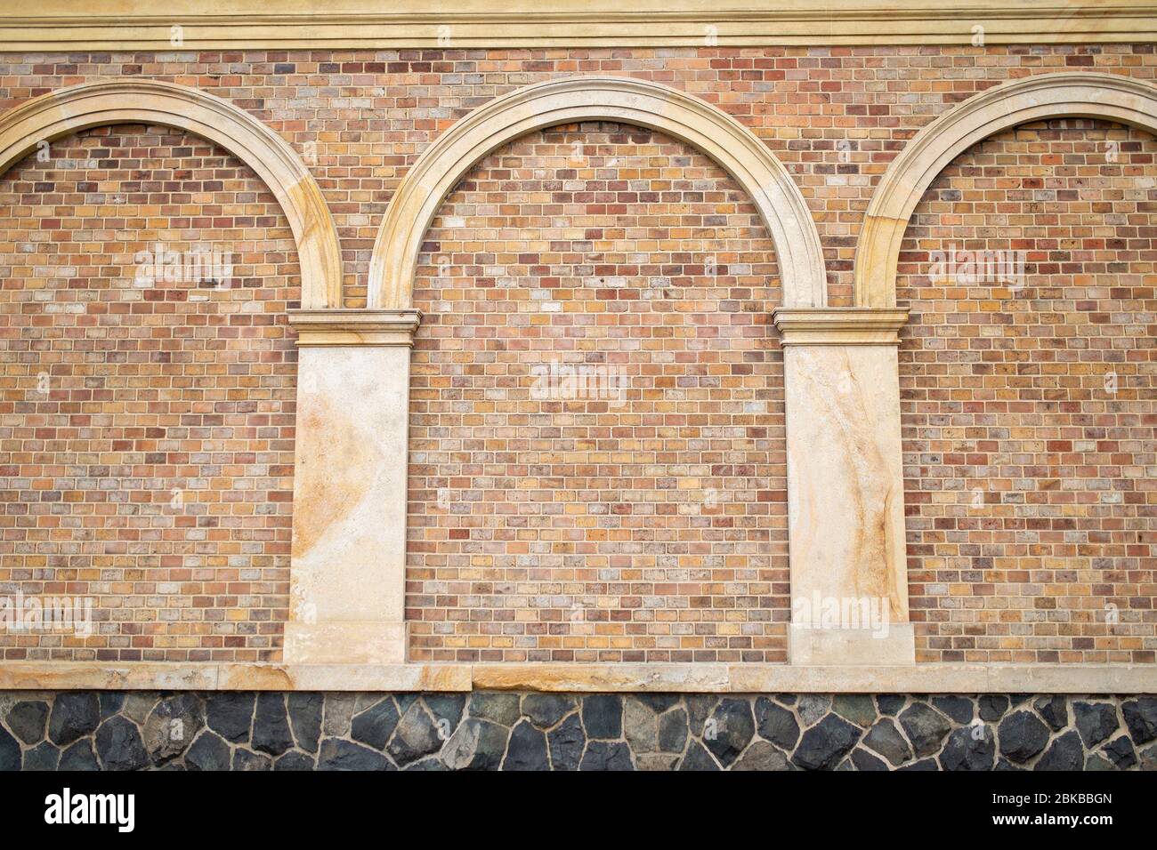 brick wall with arches, background texture Stock Photo - Alamy
