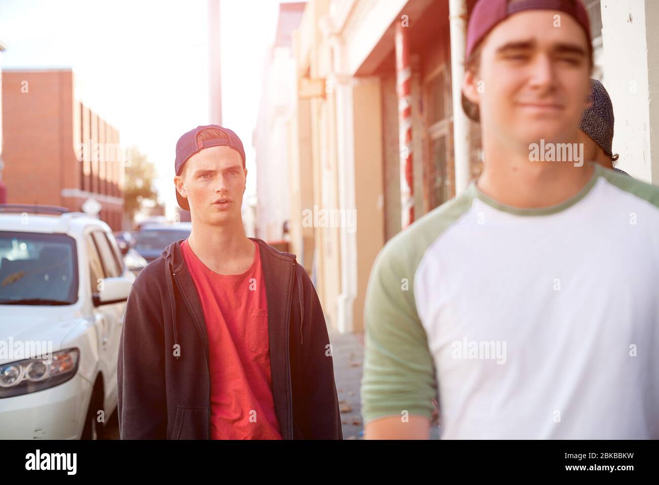 Three guys walking together hi-res stock photography and images - Alamy