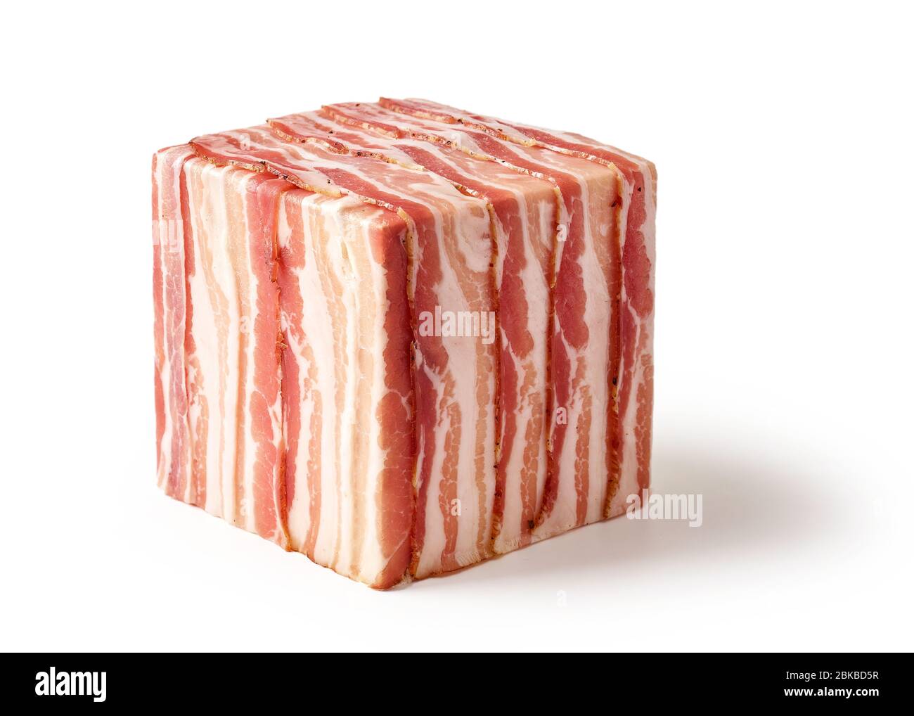 cube of prosciutto slices isolated on white background Stock Photo - Alamy