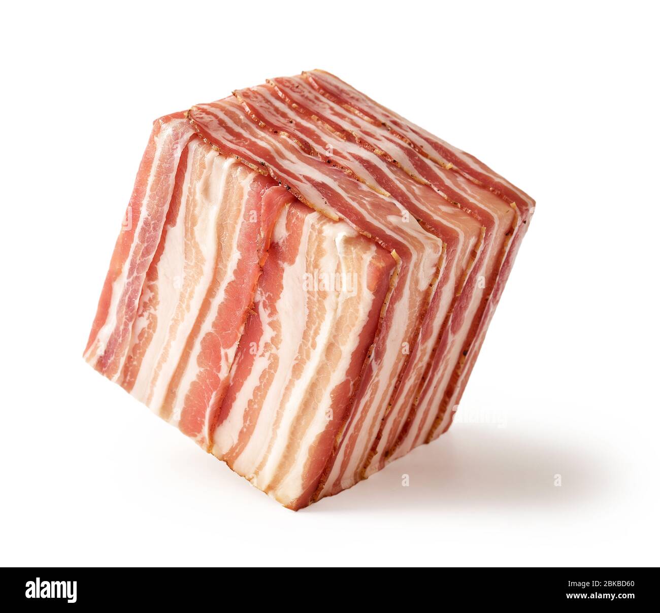 cube of prosciutto slices isolated on white background Stock Photo - Alamy