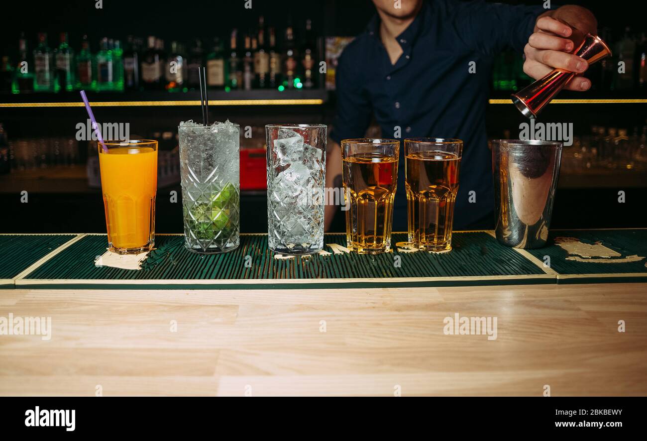 bartender makes cocktails in a restaurant, background texture Stock ...