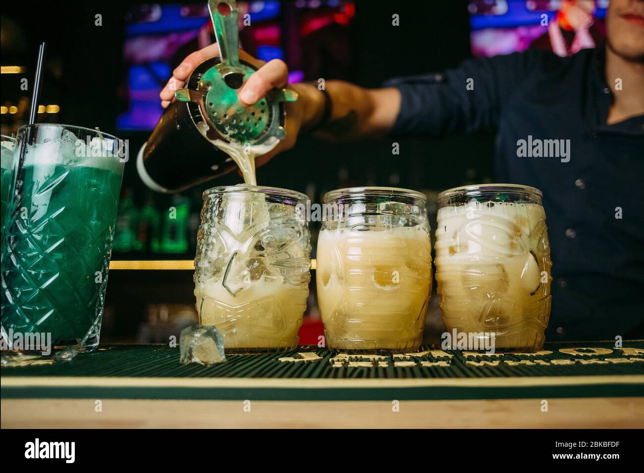 bartender makes cocktails in a restaurant, background texture Stock ...