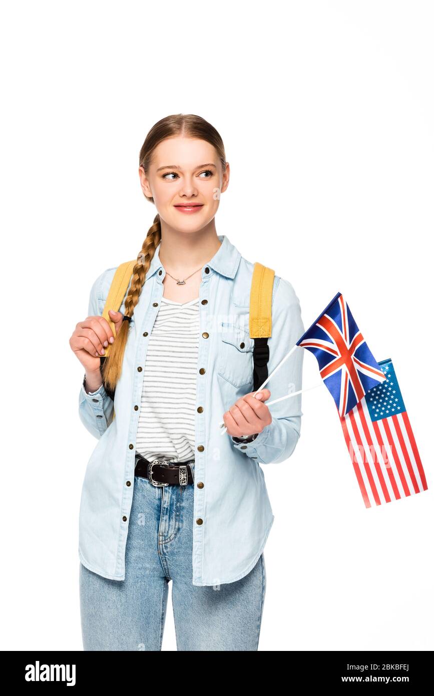 smiling girl with braid and backpack holding flags of america and ...