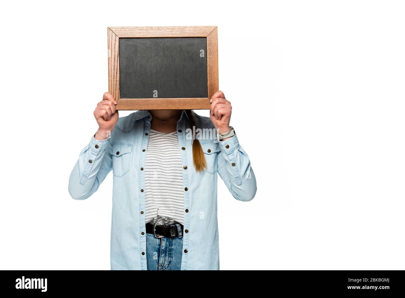 girl with obscure face holding empty chalkboard isolated on white Stock ...