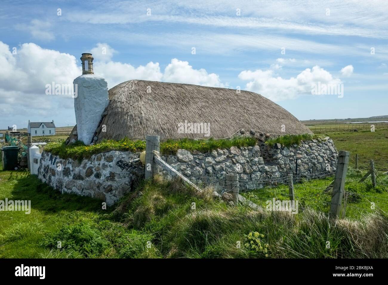 Traditional thatched blackhouse on the island of Tiree, Scotland, UK ...