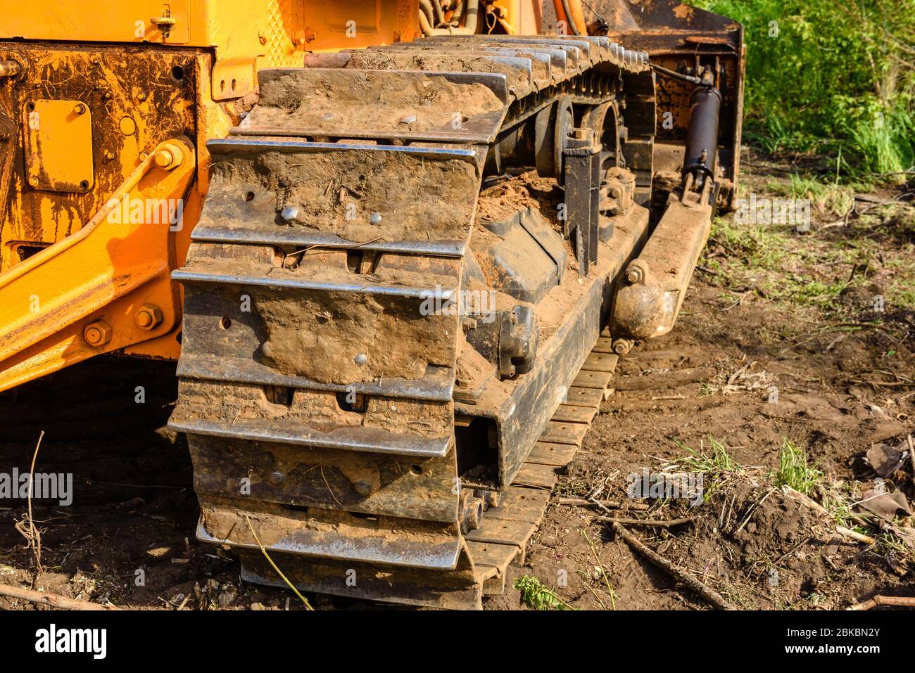 Industrial building construction site bulldozer leveling and moving ...