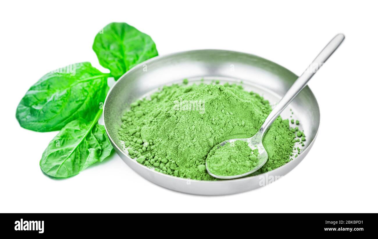 Spinach powder isolated on white background (close up; selective focus ...