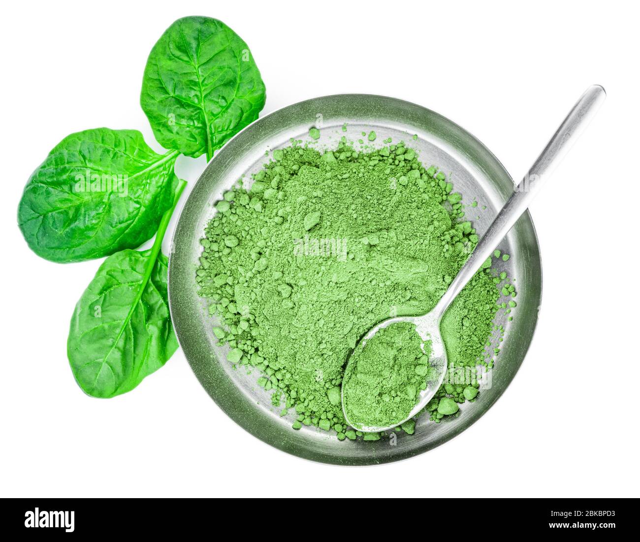 Spinach powder isolated on white background (close up; selective focus ...