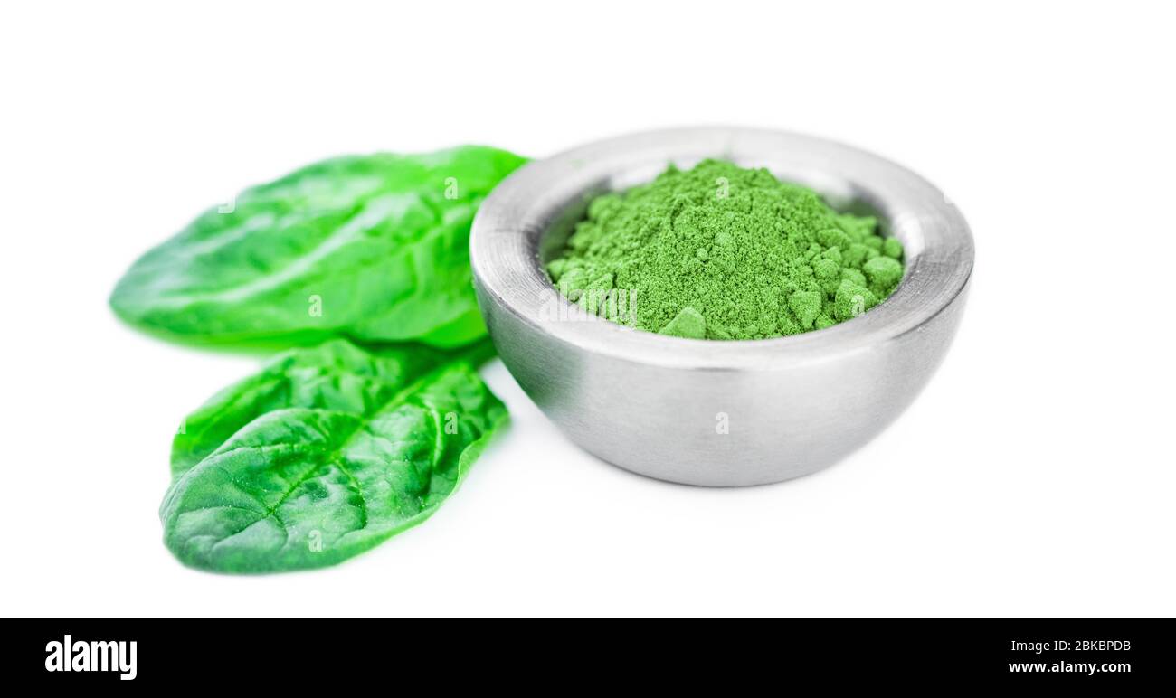 Spinach powder isolated on white background (close up; selective focus ...