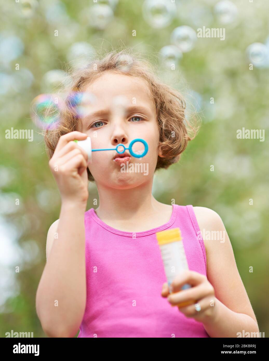 Child in a bubble hi-res stock photography and images - Alamy