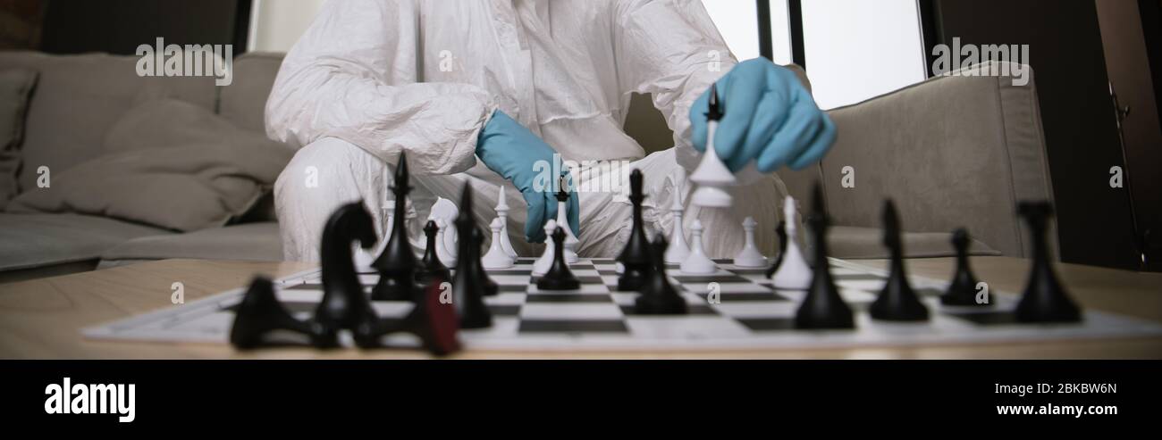 panoramic shot of man in personal protective equipment and medical mask ...