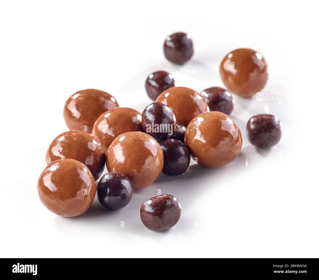 chocolate balls berries covered with chocolate isolated on white ...