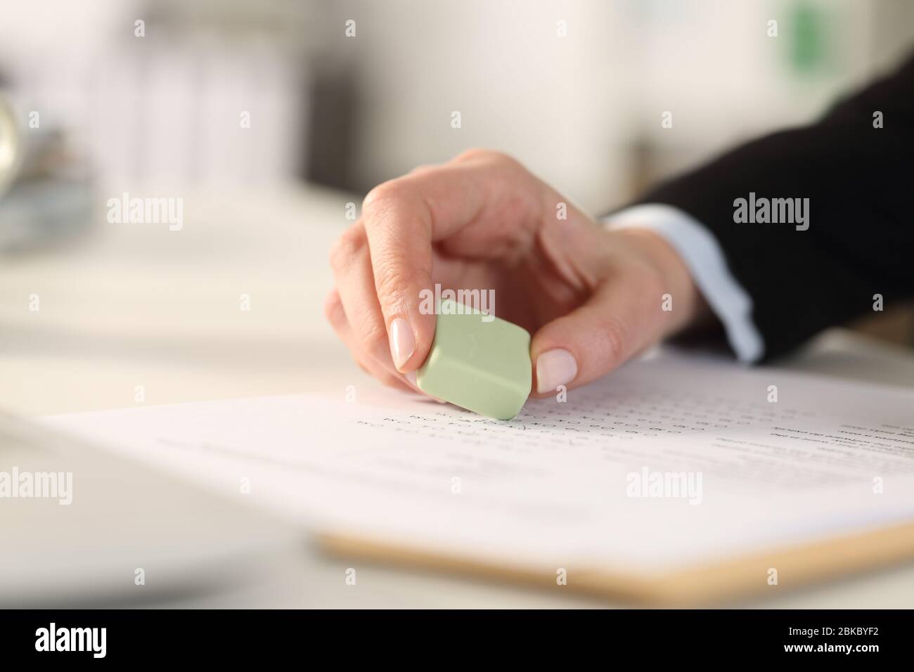 Hand holding eraser hi-res stock photography and images - Alamy