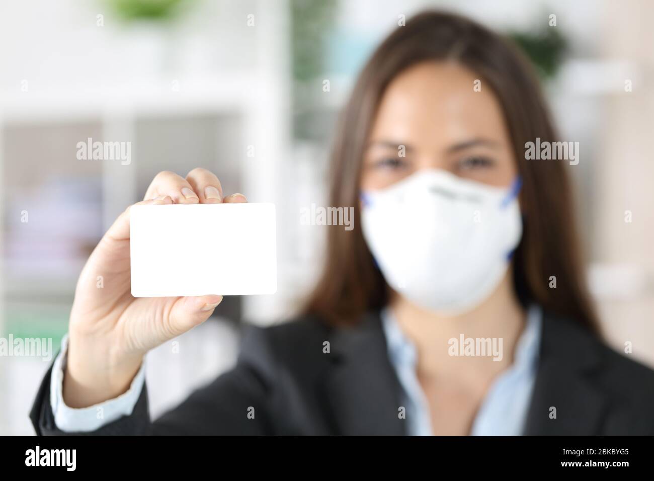 Front view of executive woman hand showing blank credit card avoiding ...