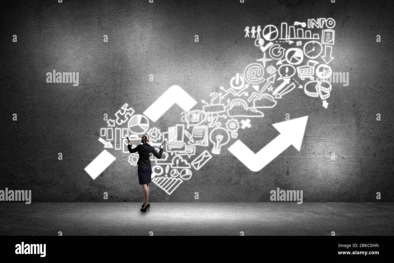 Woman throwing light on her ideas Stock Photo - Alamy