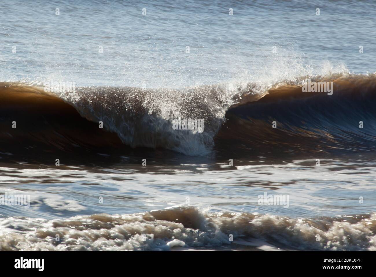 Ocean waves breaking at the beach Stock Photo - Alamy