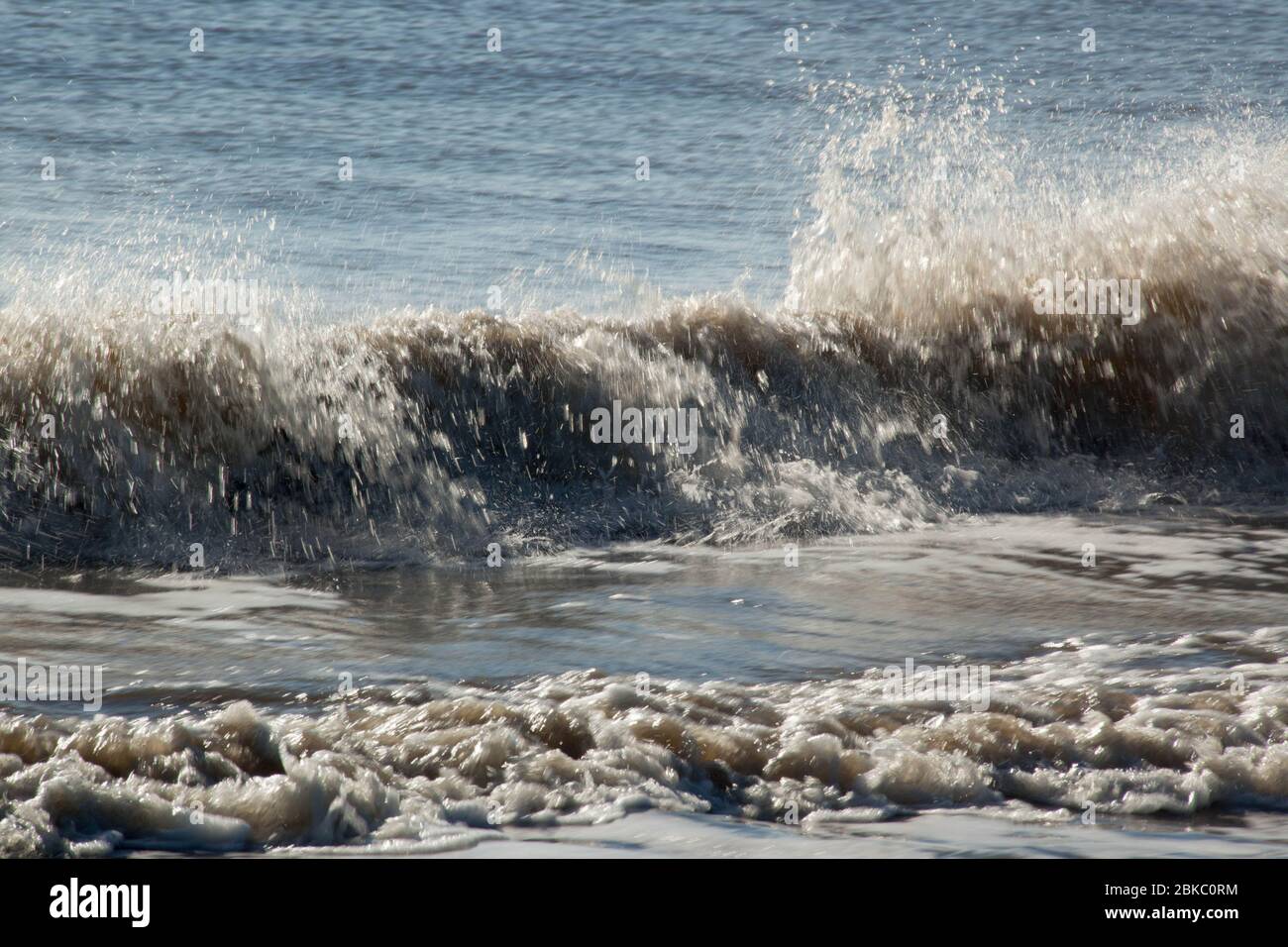 Ocean waves breaking at the beach Stock Photo - Alamy