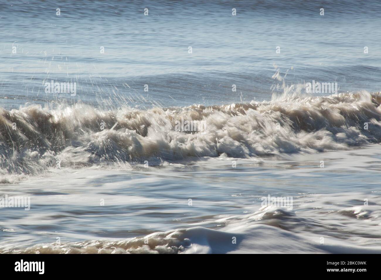 Ocean waves breaking at the beach Stock Photo - Alamy