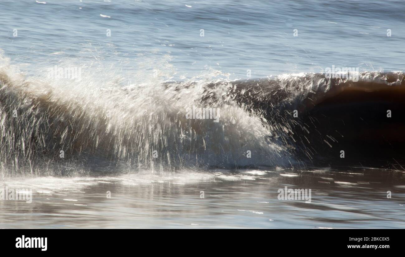 Ocean waves breaking at the beach Stock Photo - Alamy