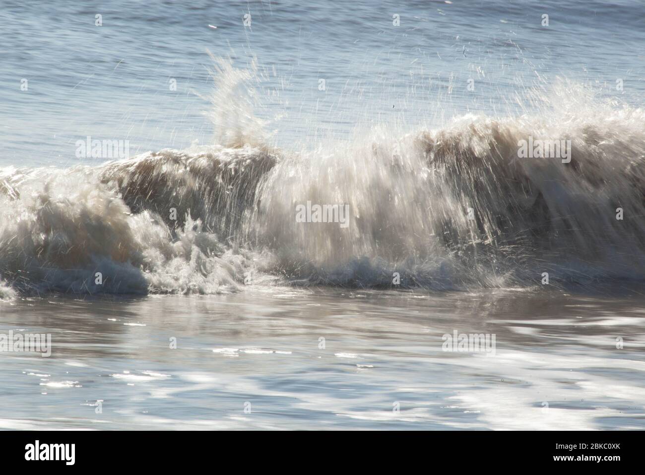 Ocean waves breaking at the beach Stock Photo - Alamy