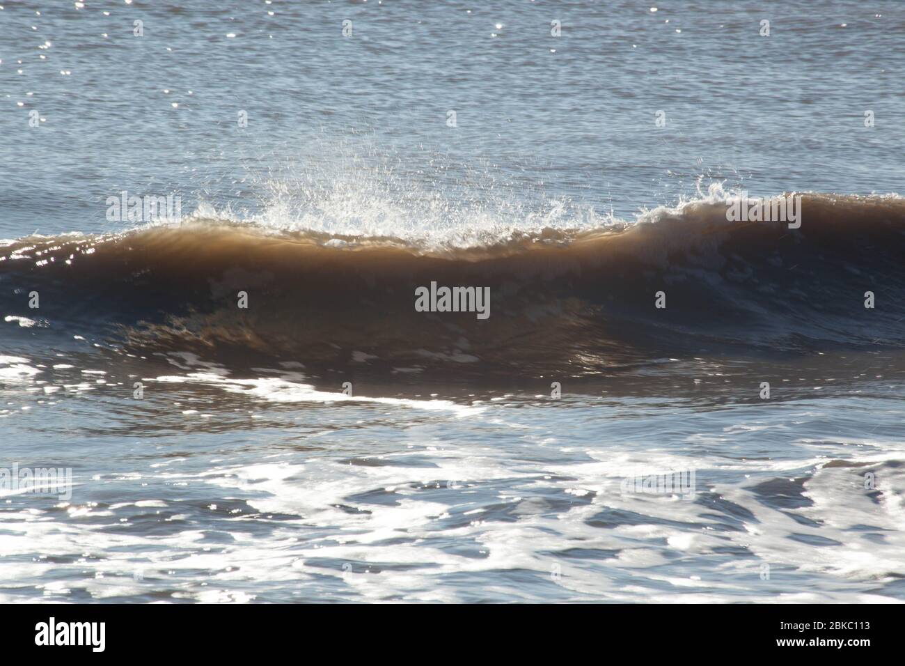 Ocean waves breaking at the beach Stock Photo - Alamy